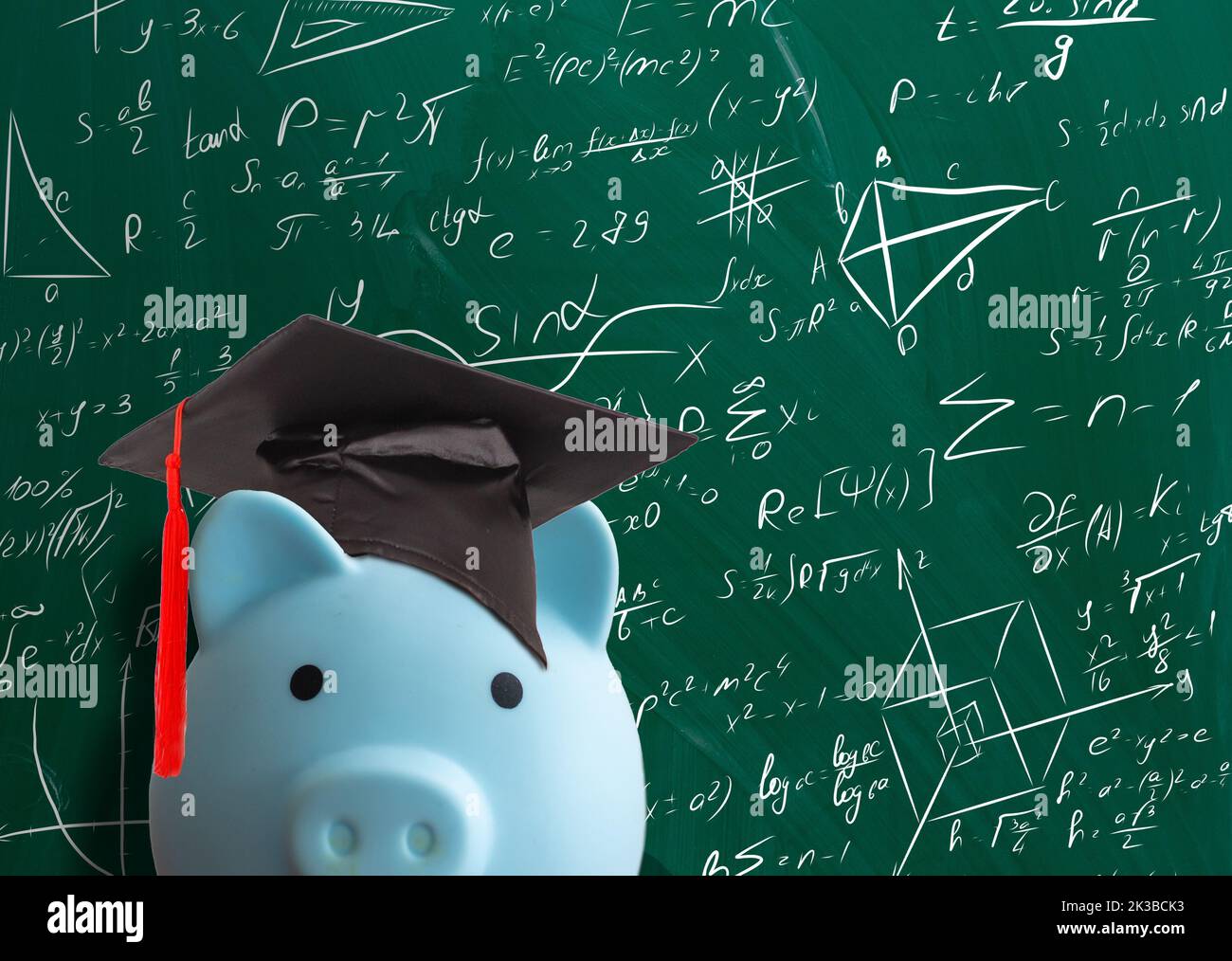 piggy bank in front of chalk board Stock Photo - Alamy