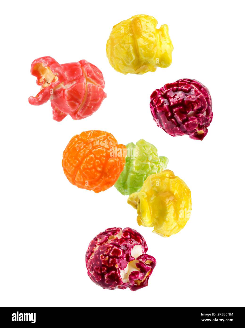 Falling Colored fruity popcorn isolated on white background, clipping ...