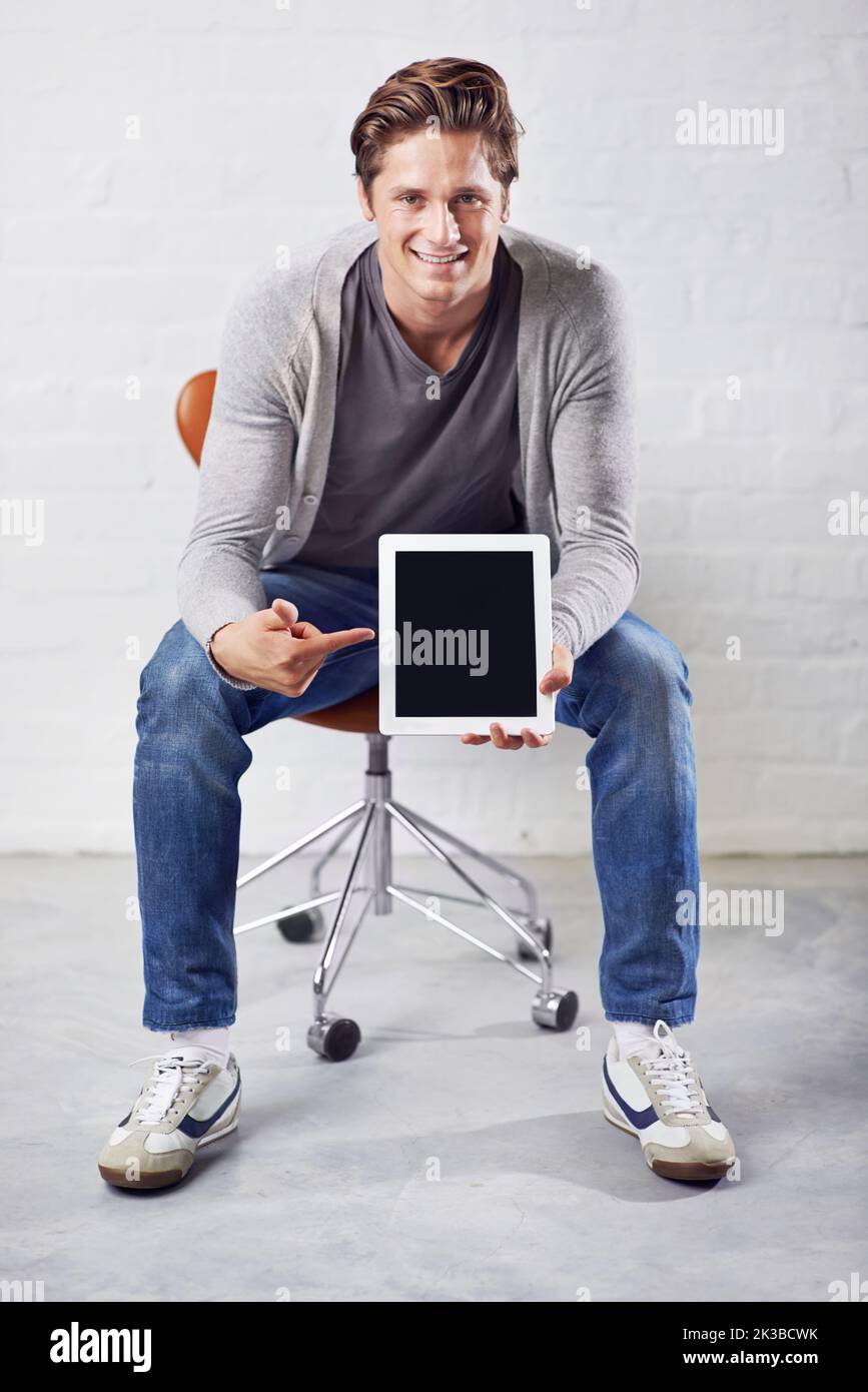 I endorse this tablet. A handsome young man showing you the latest ...