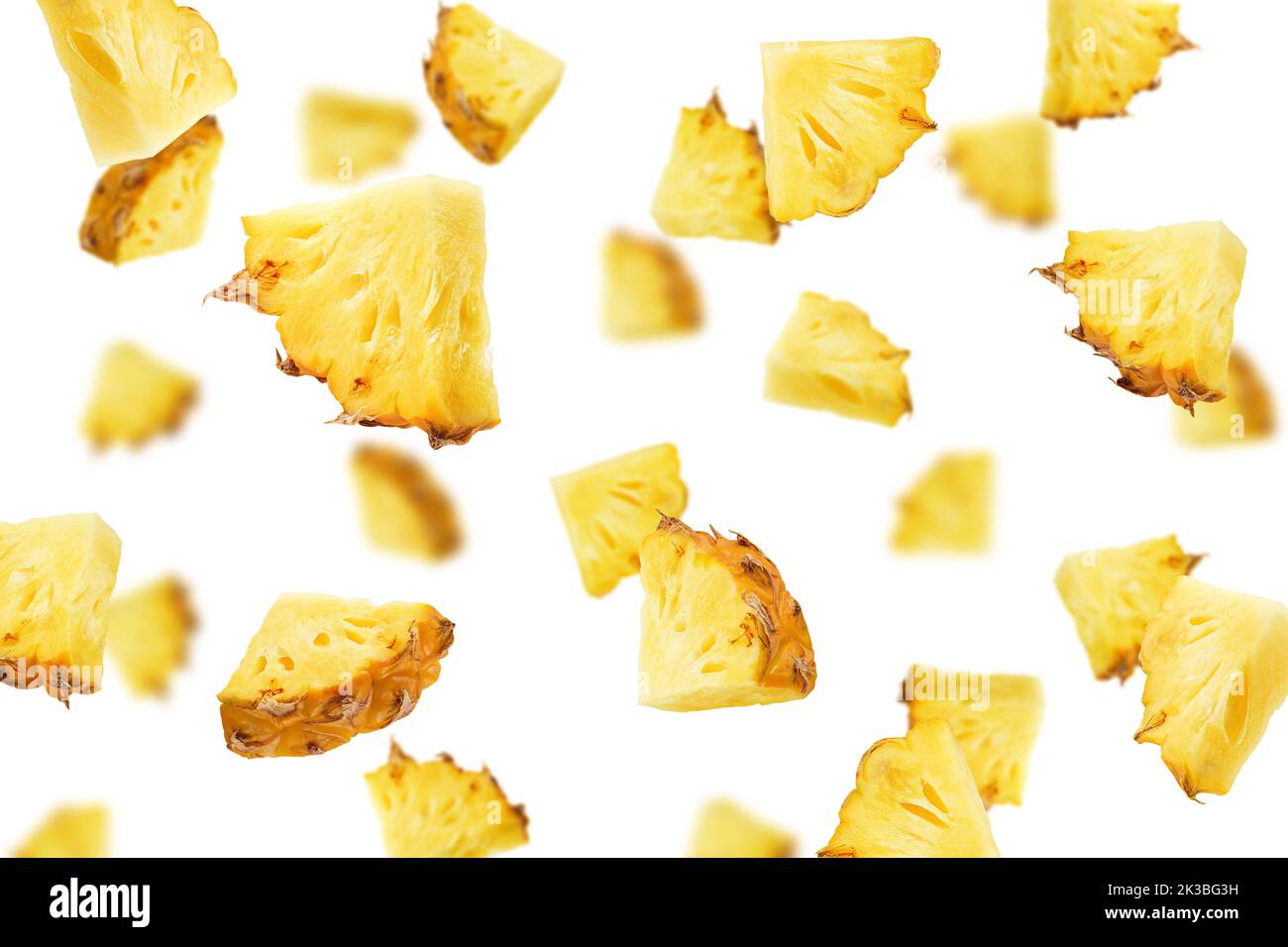 Falling pineapple slice isolated on white background, selective focus ...