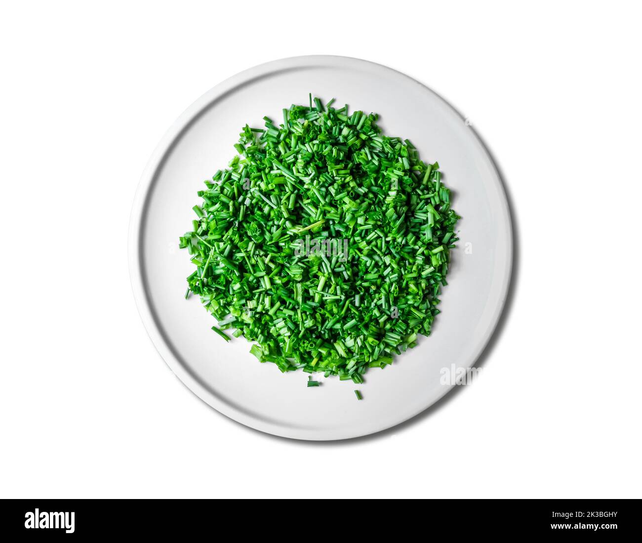 Fresh cut chives on a white plate Stock Photo - Alamy