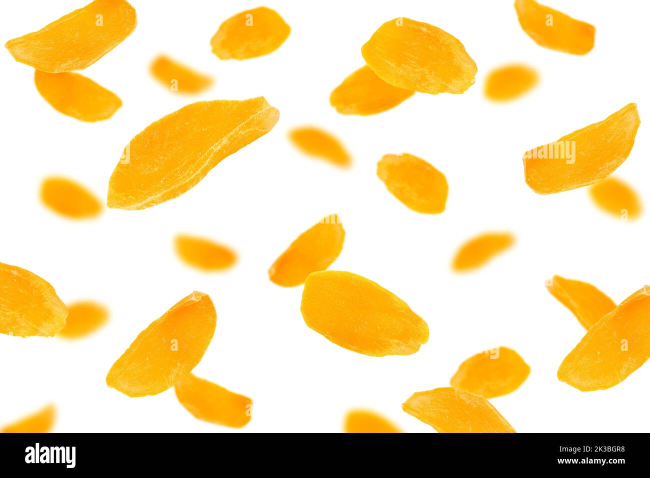 Falling Dried Mango, isolated on white background, selective focus ...