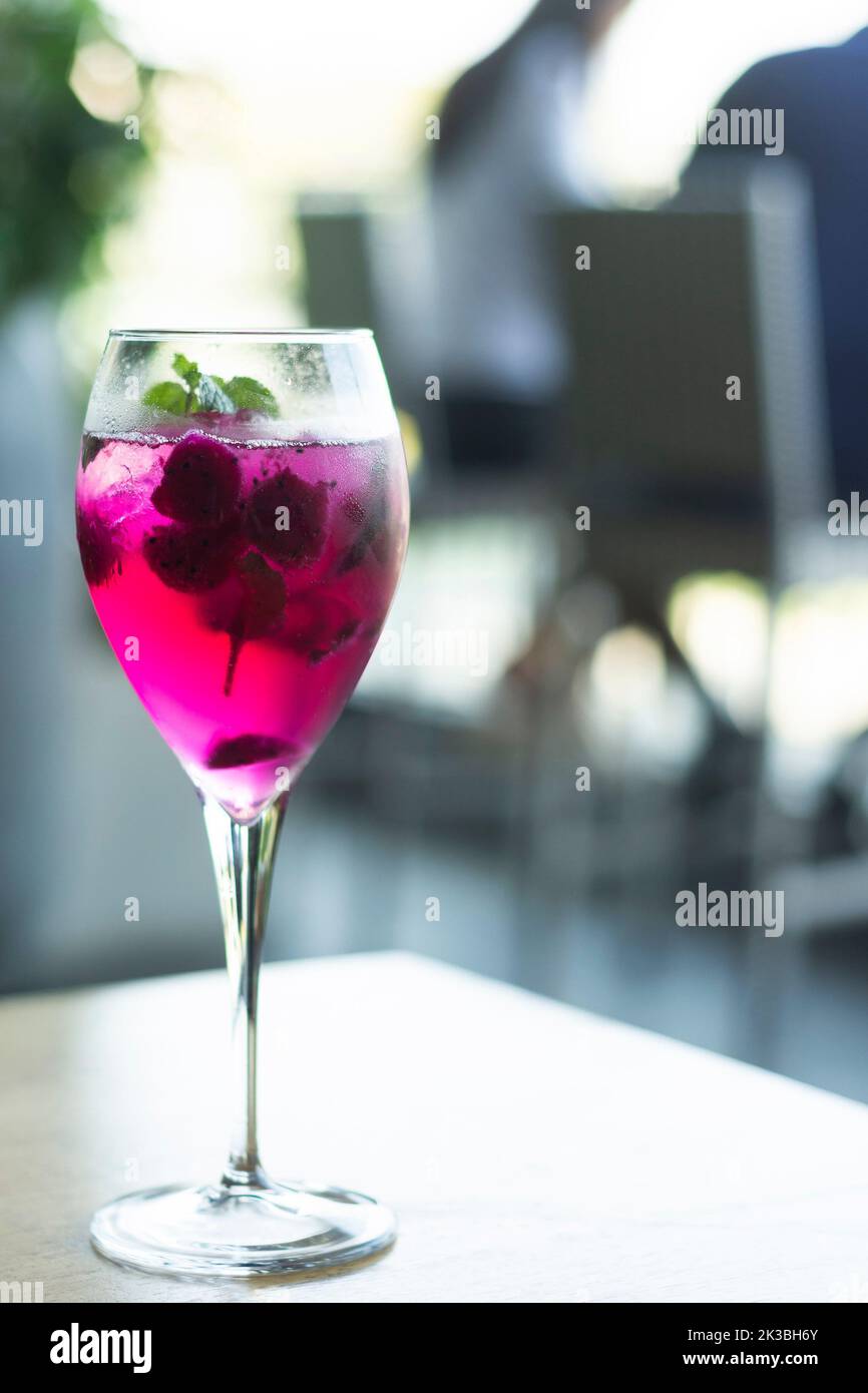 raspberry and red dragon fruit prosecco wine spritzer cocktail Stock ...