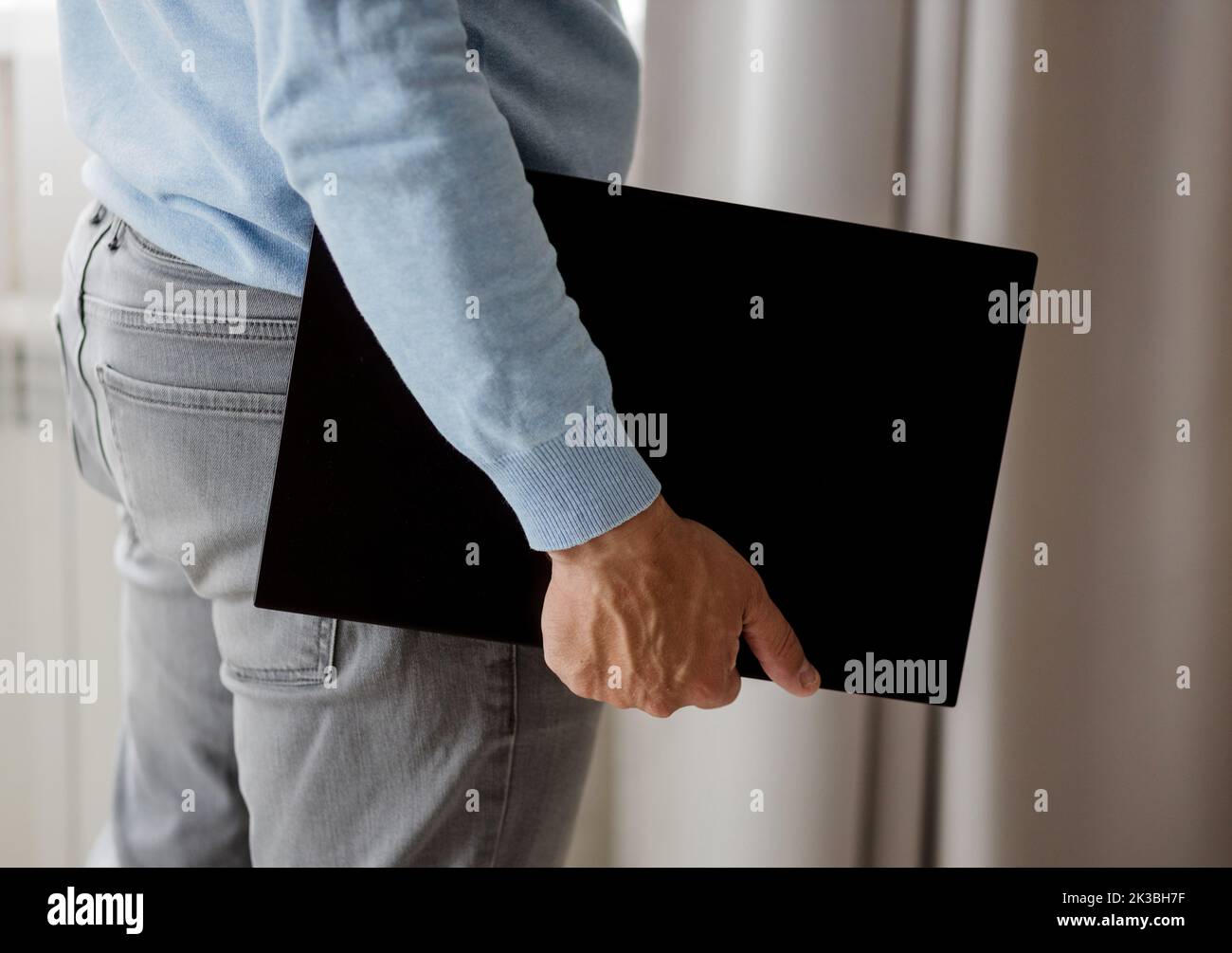 Employee carrying laptop hi-res stock photography and images - Alamy