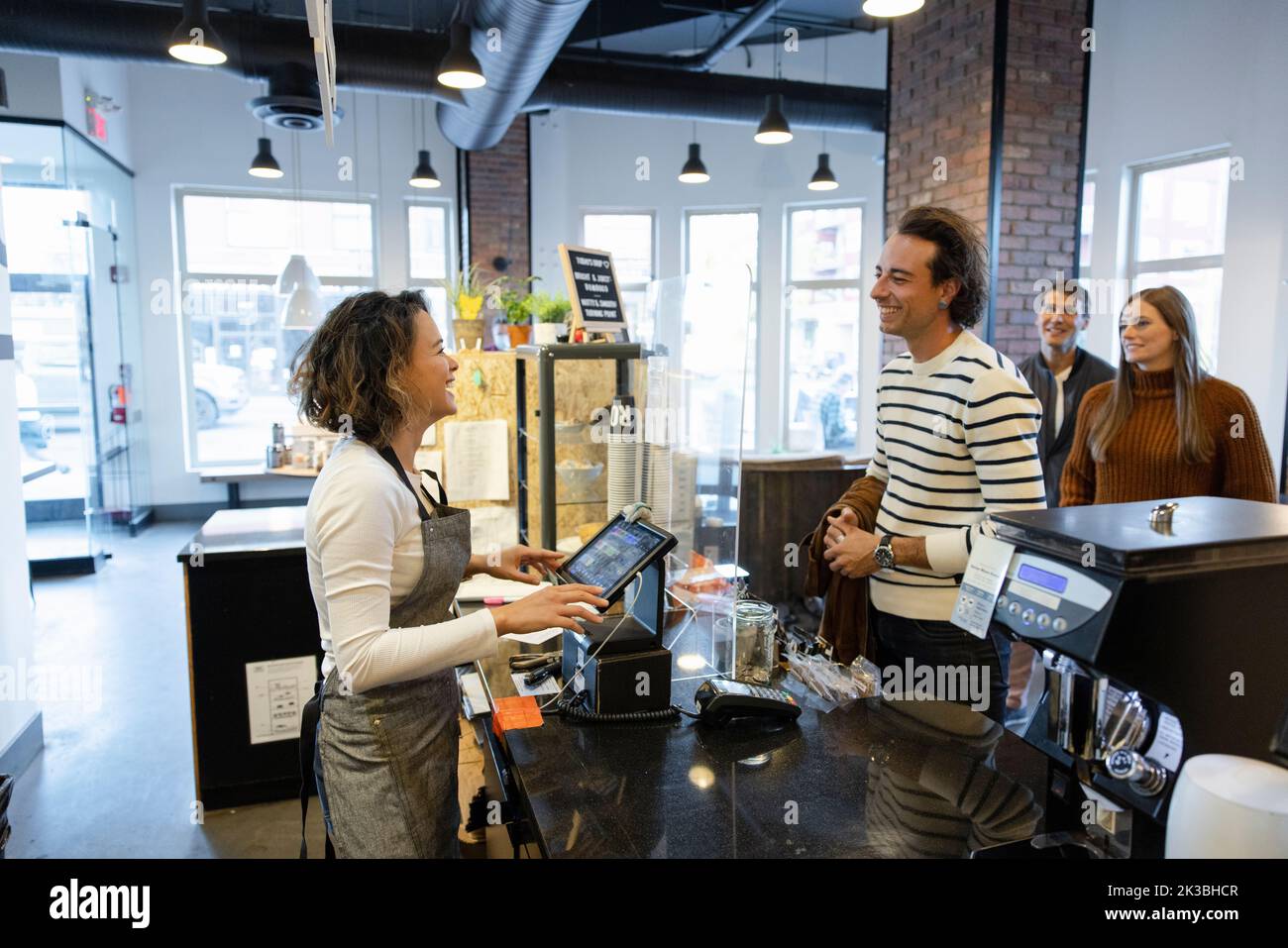 Woman ordering coffee shop hi-res stock photography and images - Alamy