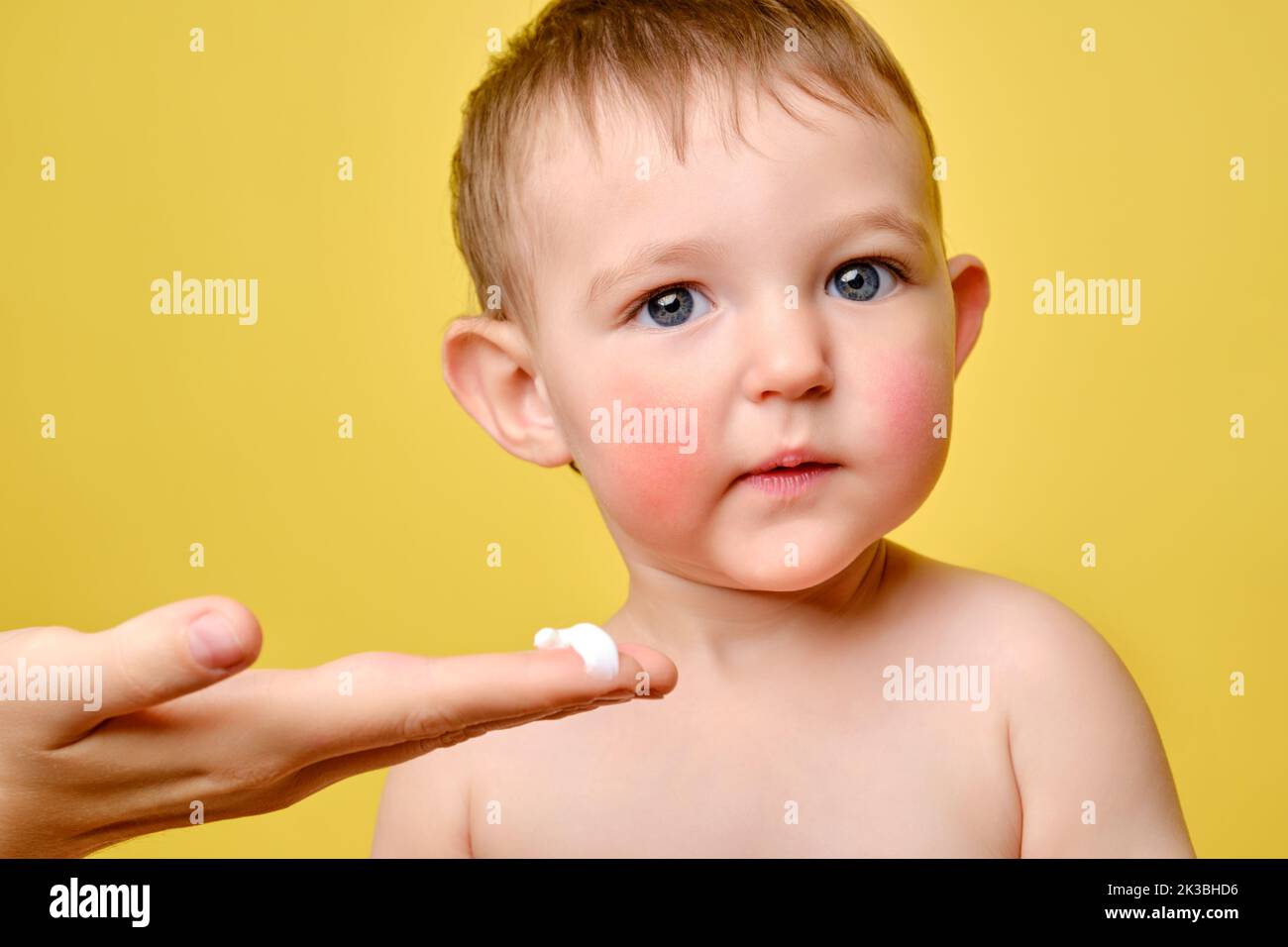 Baby cream boy skin hi-res stock photography and images - Alamy