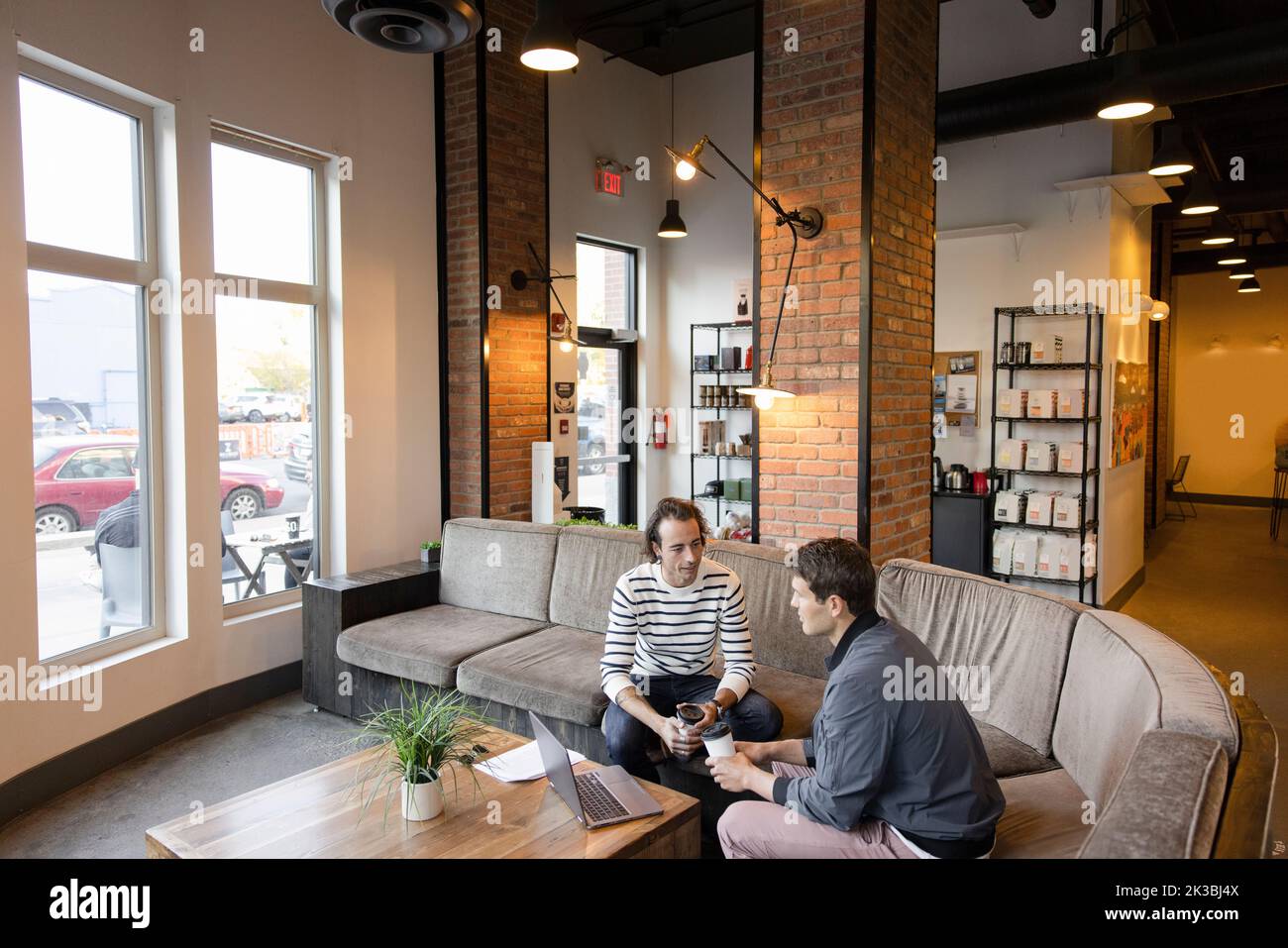 Two men drink coffee together hi-res stock photography and images - Alamy