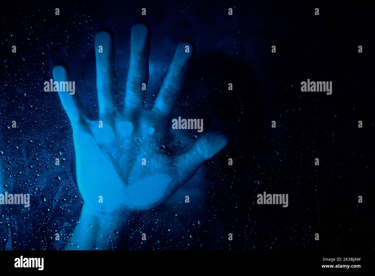 Hand through water wall hi-res stock photography and images - Alamy