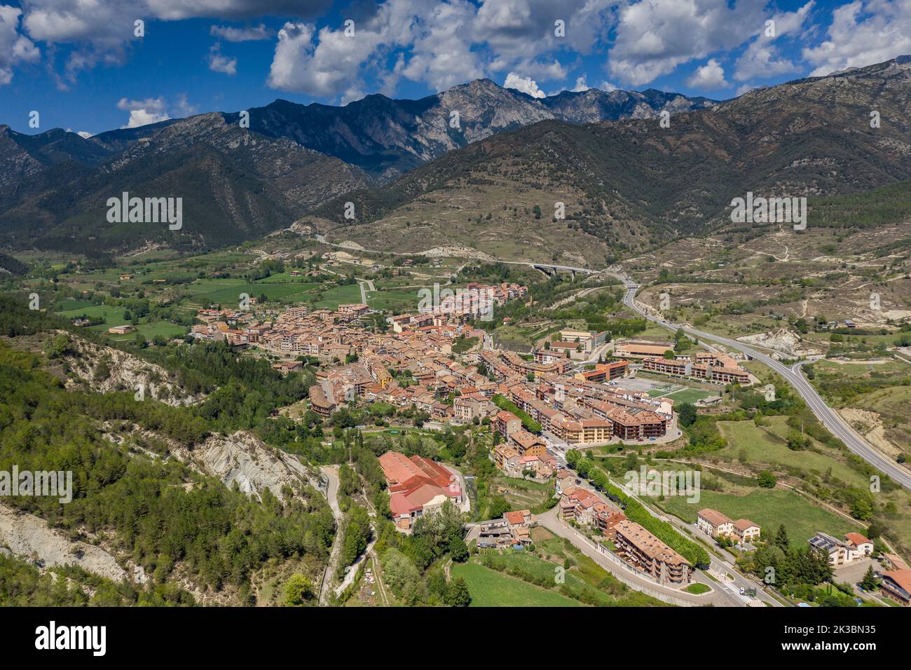 Aerial view of the town of Bagà. In the background, the Moixeró ...