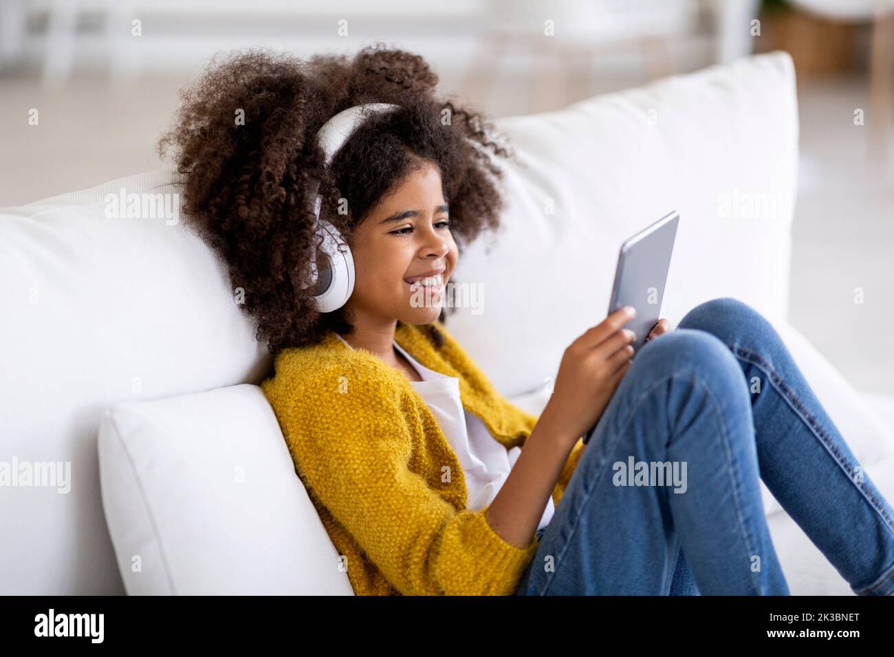 Child watching cartoons hi-res stock photography and images - Alamy