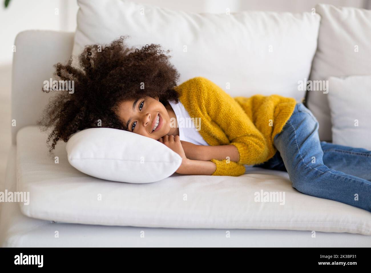 Child reclining chilling hi-res stock photography and images - Alamy