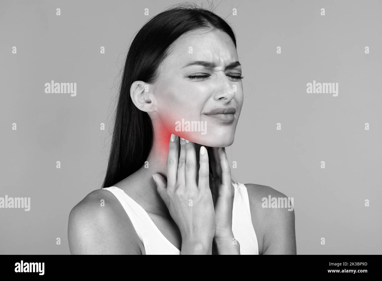 Black and white photo of young sick lady suffering from tonsillitis ...