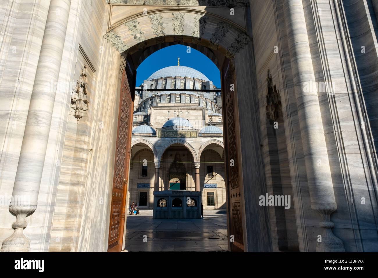Suleymaniye Mosque entrance and dome view with a blue sky, old ancient ...