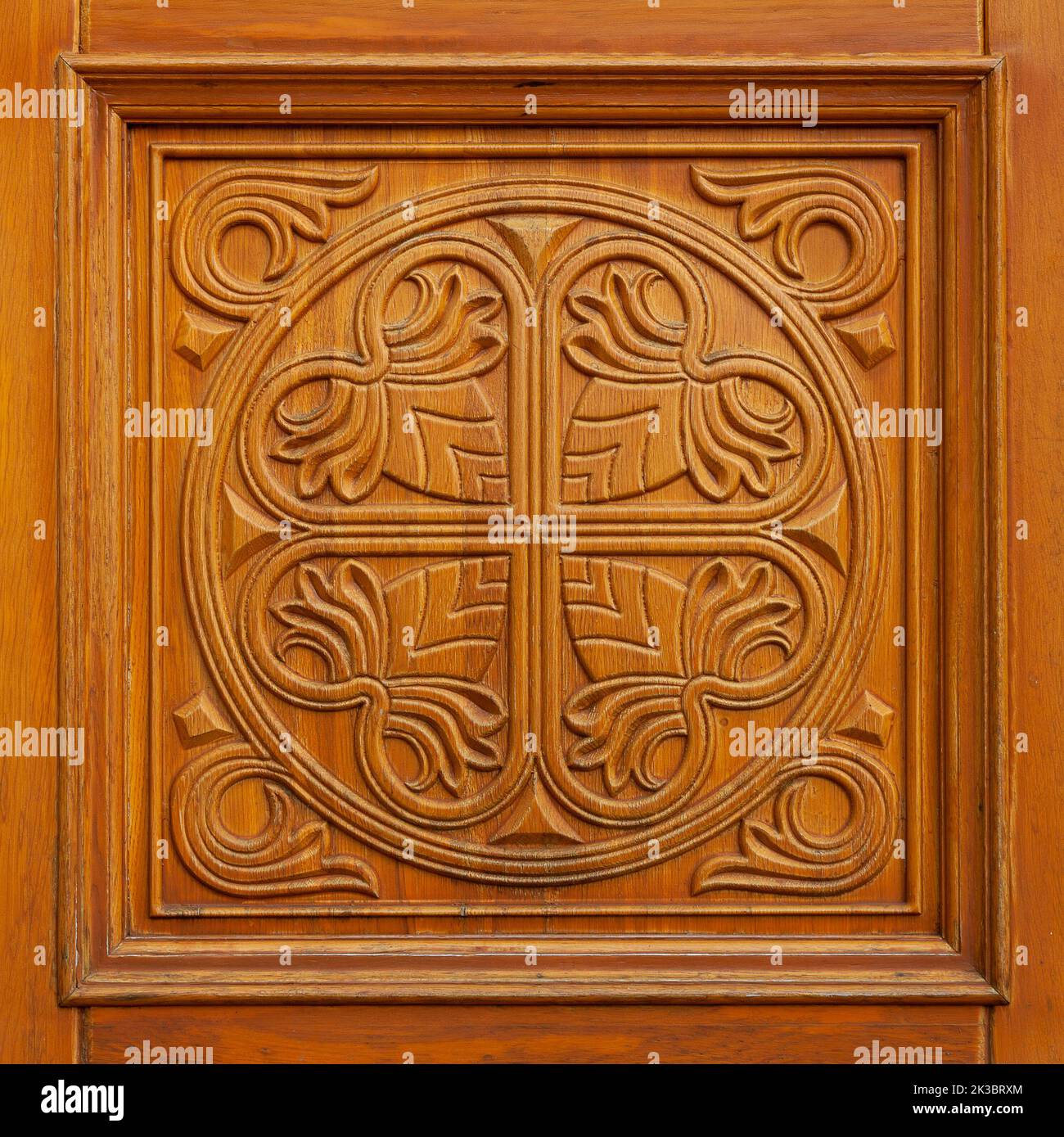 Worn wood panel with carved floral design Stock Photo - Alamy