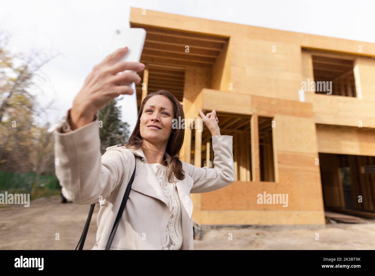 Standing watching construction site architecture building exterior hi ...