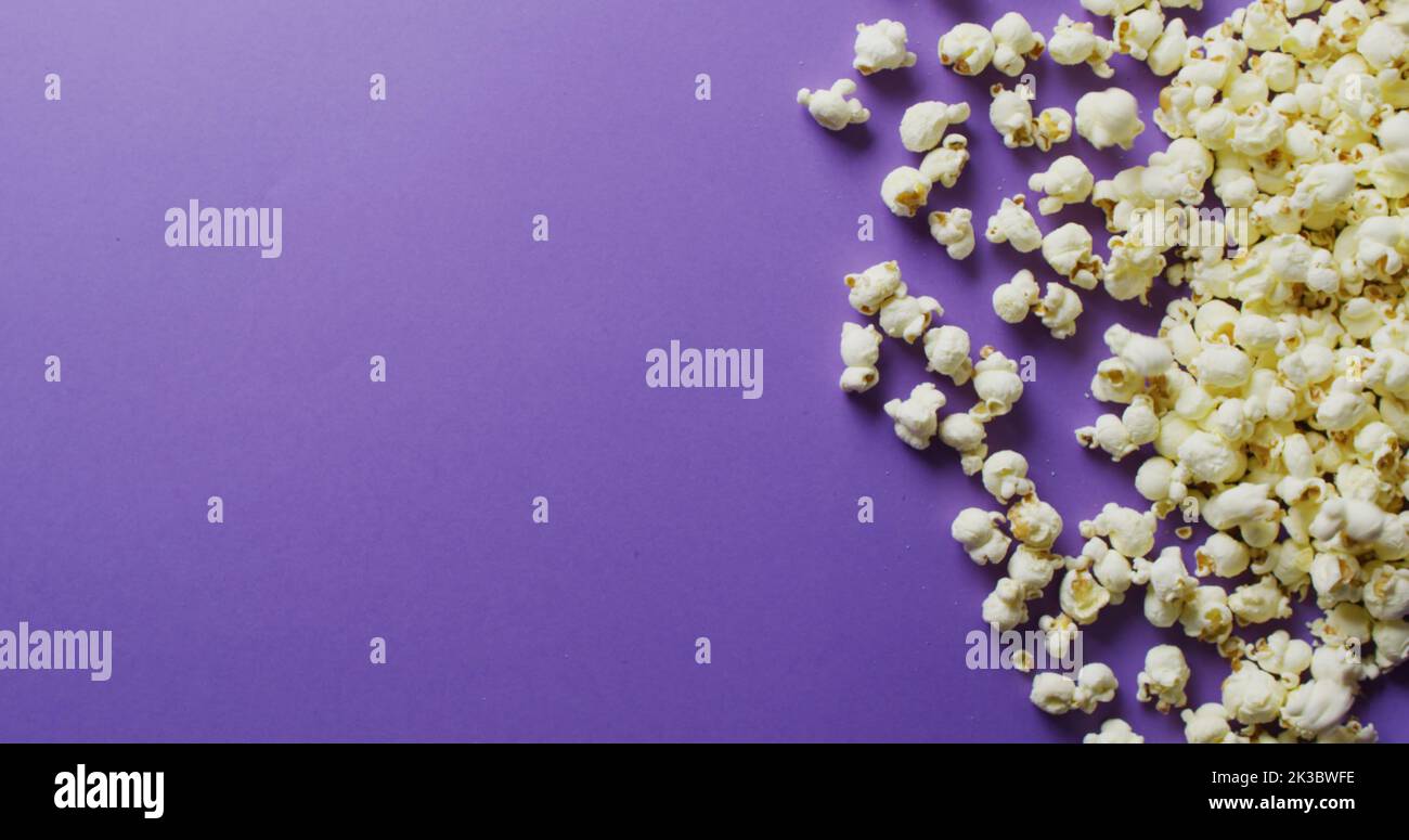 Image of close up of popcorn on purple background Stock Photo - Alamy