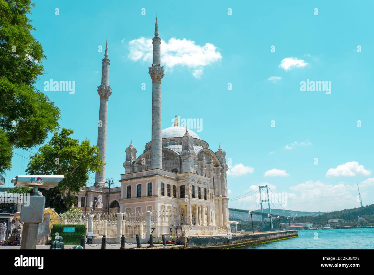 Ortakoy Mosque minarets and dome wide view with sunny sky, known as ...