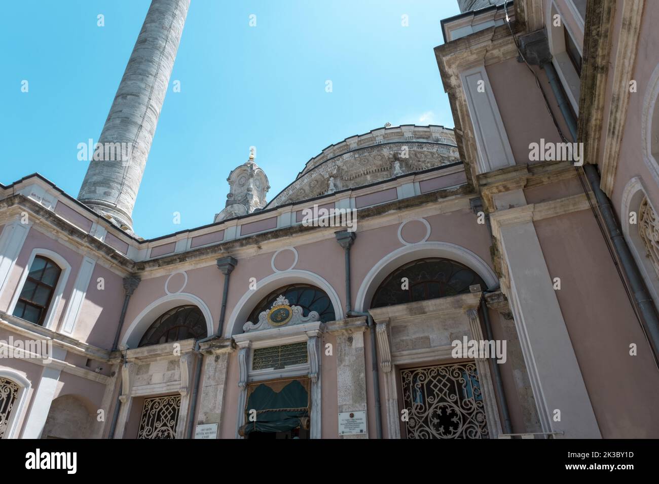 Ortakoy Mosque entrance with minarets and dome bottom view with open ...