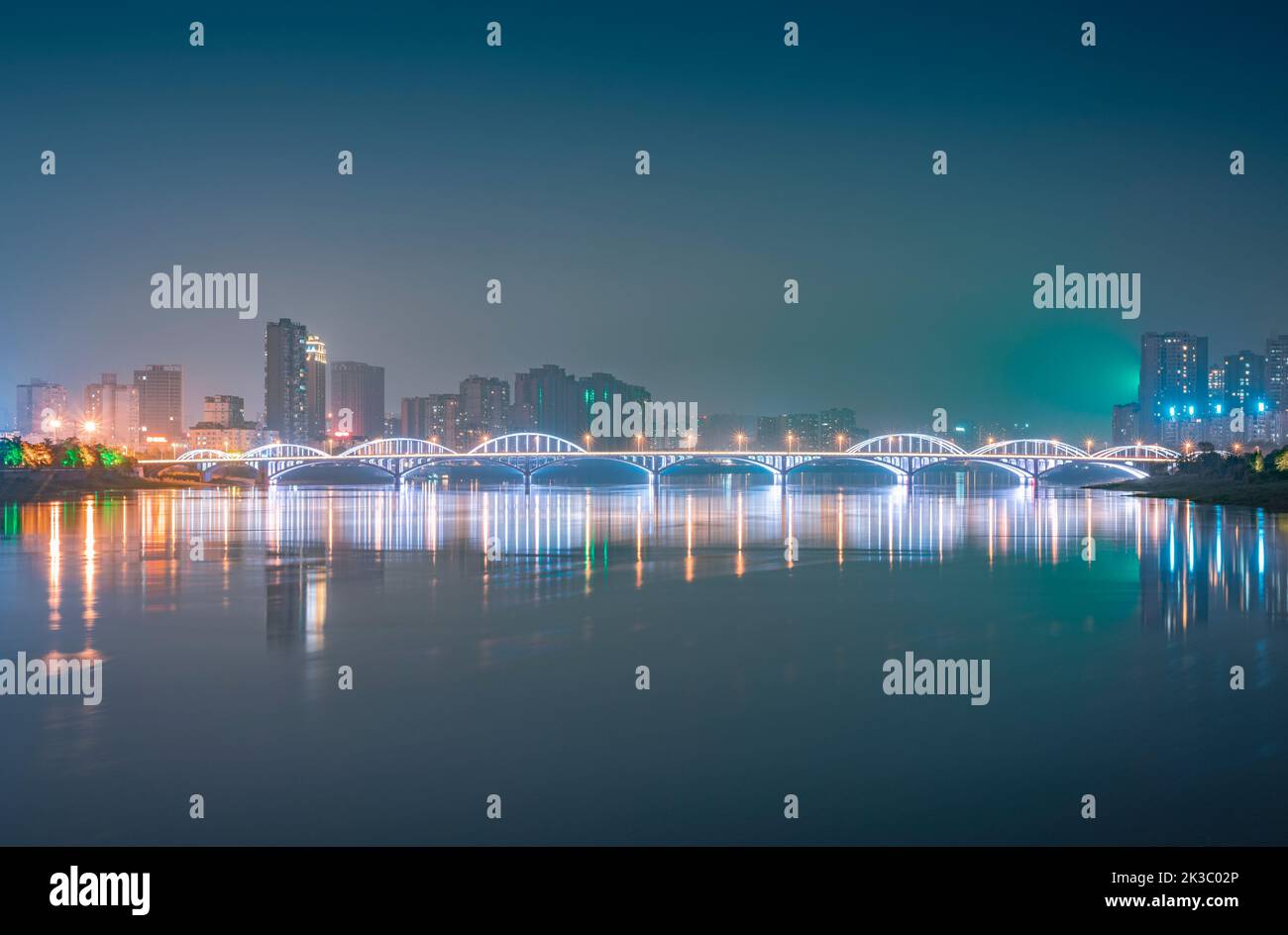 The Min River Bridge in Leshan, China, and the city at night Stock ...