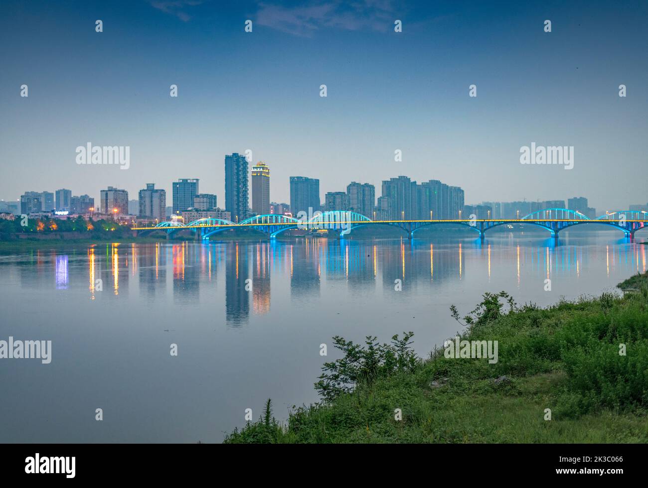 The Min River Bridge in Leshan, China, and the city at night Stock ...