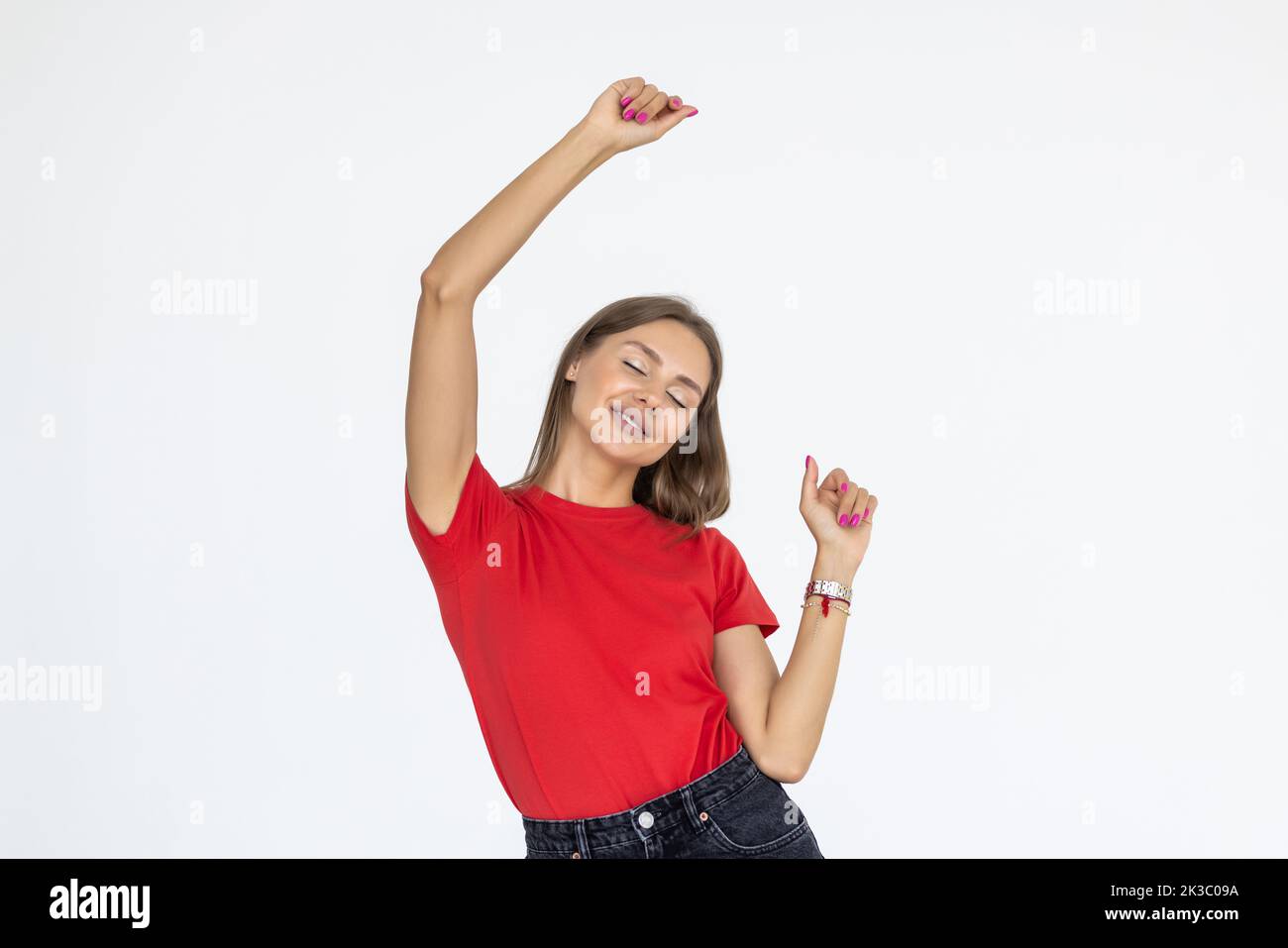 Portrait of successful winner celebrating by dancing. Beautiful young ...