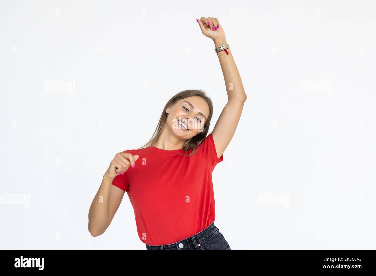 Portrait of successful winner celebrating by dancing. Beautiful young ...