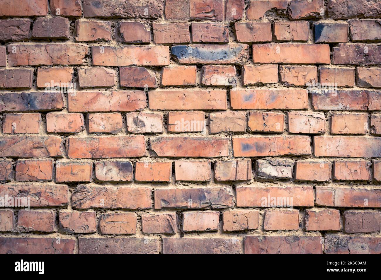 Red old worn brick wall background. Vintage effect. Abstract pattern of bricks. Grunge concrete ...