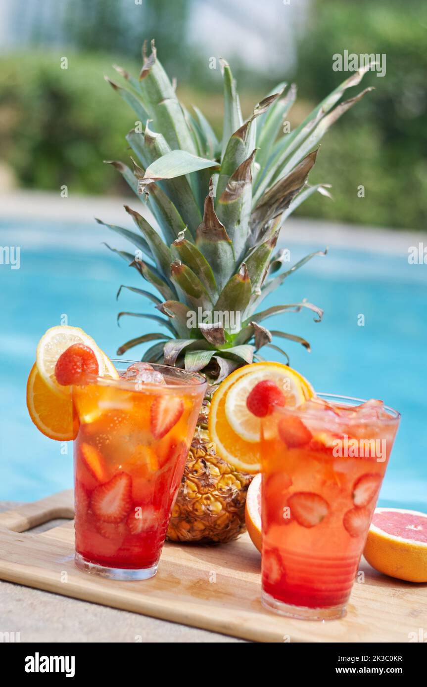 fruit cocktails by the pool Stock Photo - Alamy