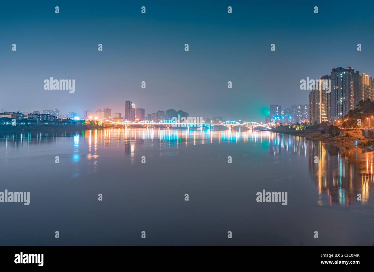 The Min River Bridge in Leshan, China, and the city at night Stock ...