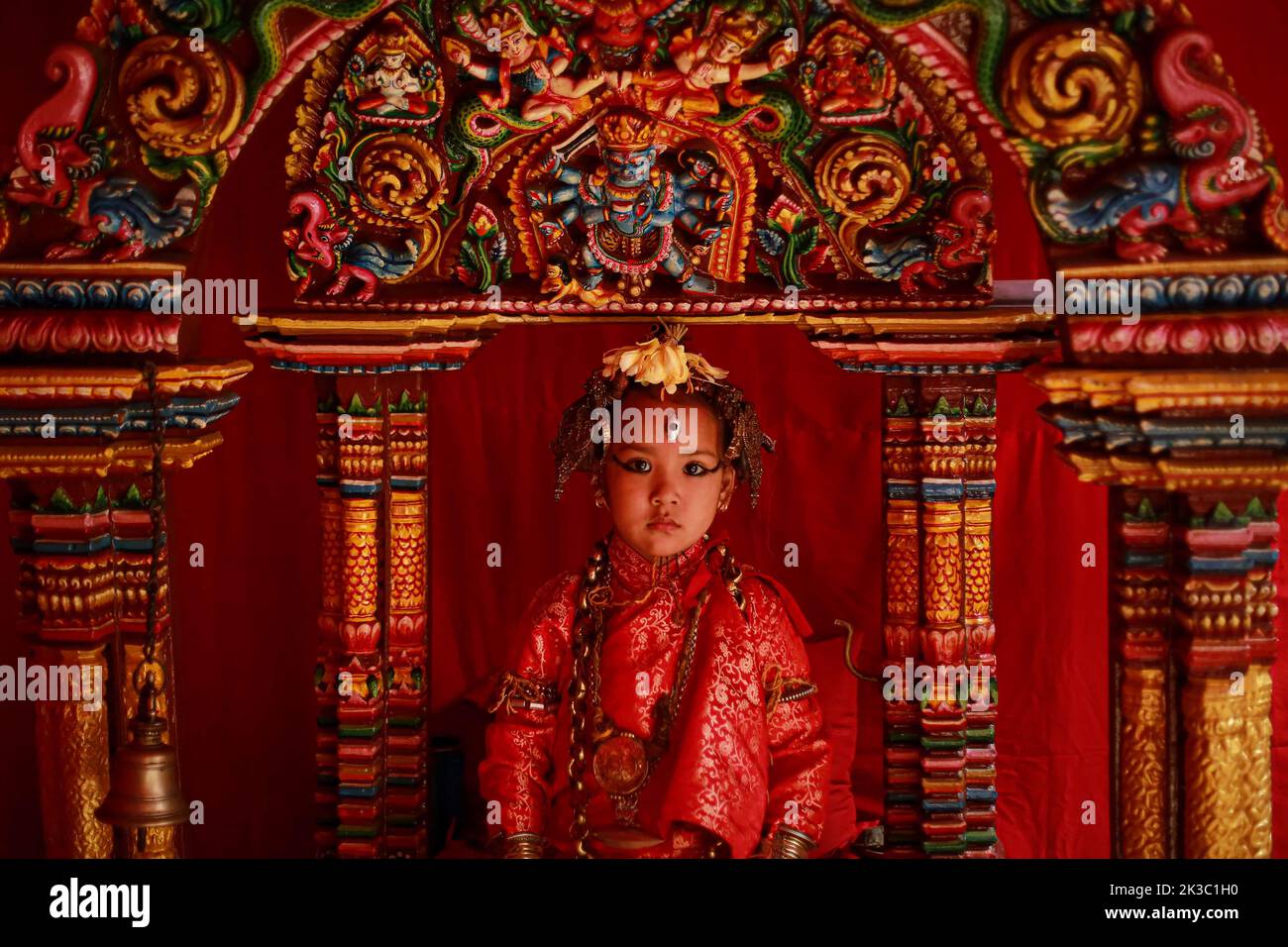 Nepal. 26th Sep, 2022. Living Goddess Kumari of Bhaktapur sits on her ...