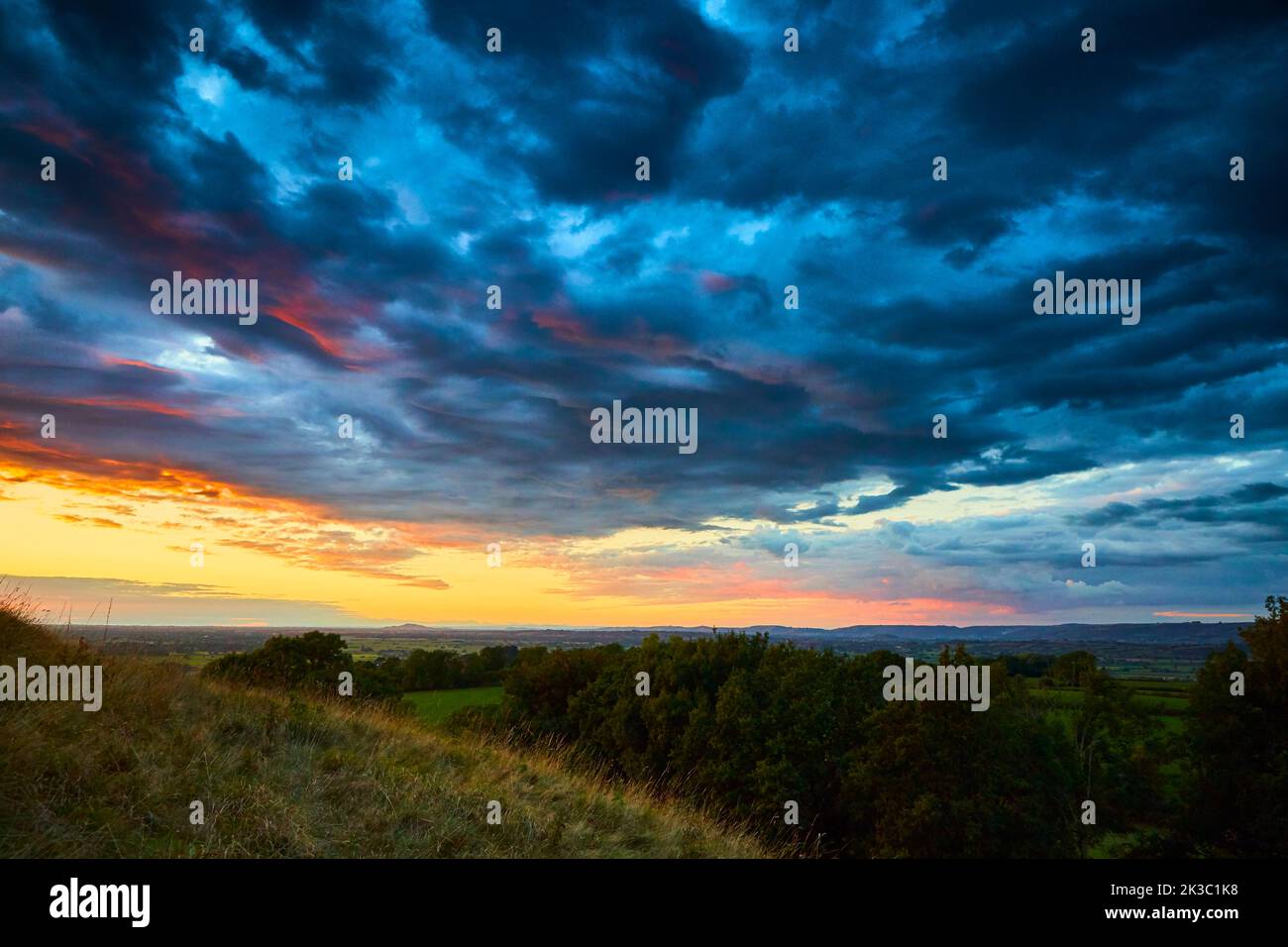 Dramatic clouds and sunset from Glastonbury Tor, Somerset Stock Photo ...