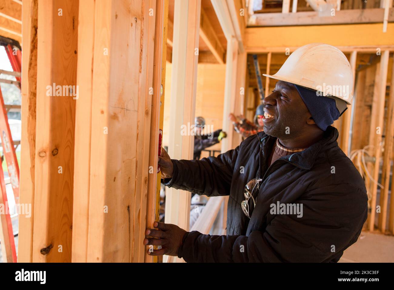 Construction worker smiling on site hi-res stock photography and images ...