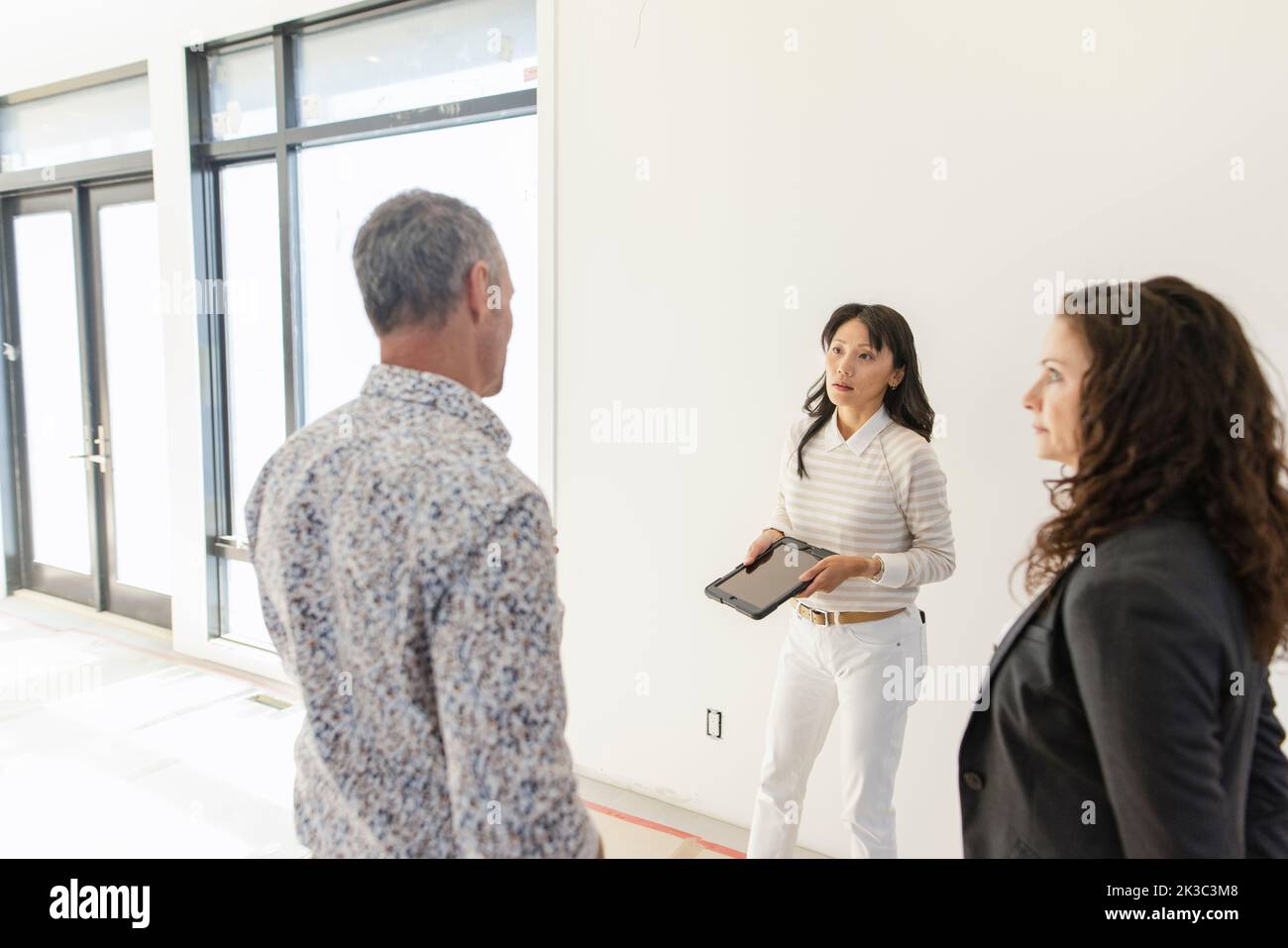 Interior designer talking client hi-res stock photography and images ...