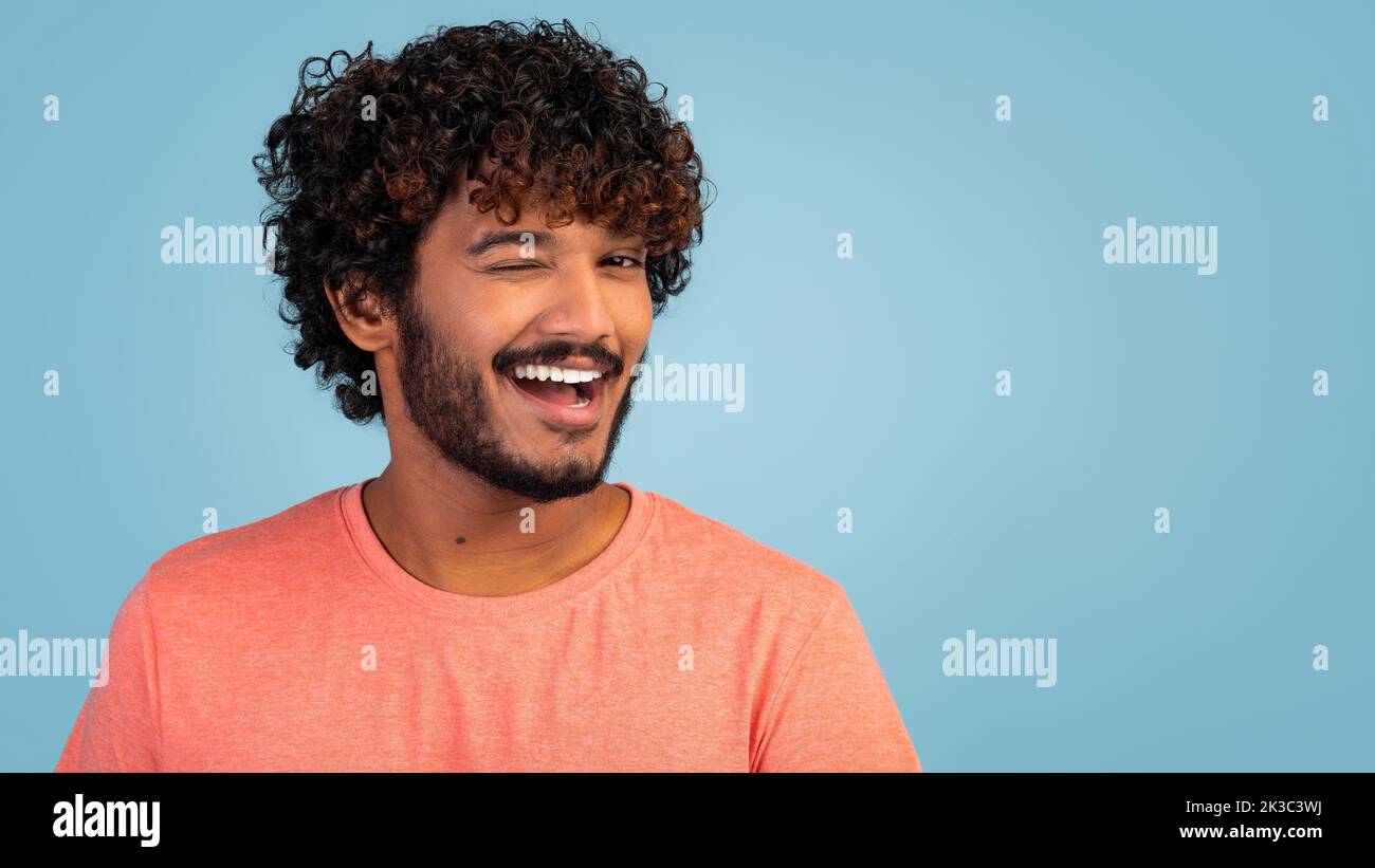 Indian man winking hi-res stock photography and images - Alamy