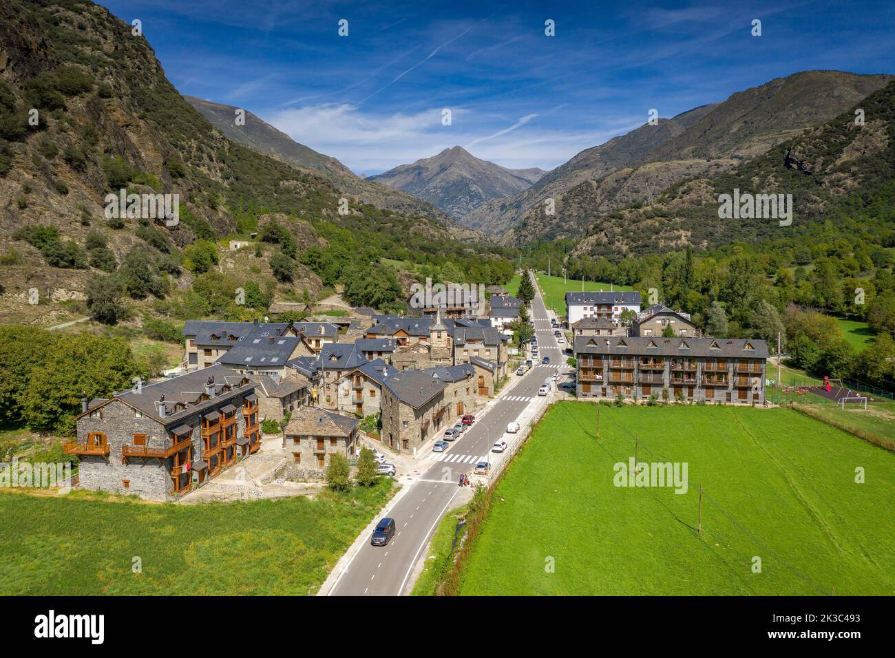 Aerial view of the village of Ainet de Cardós and the surrounding green ...