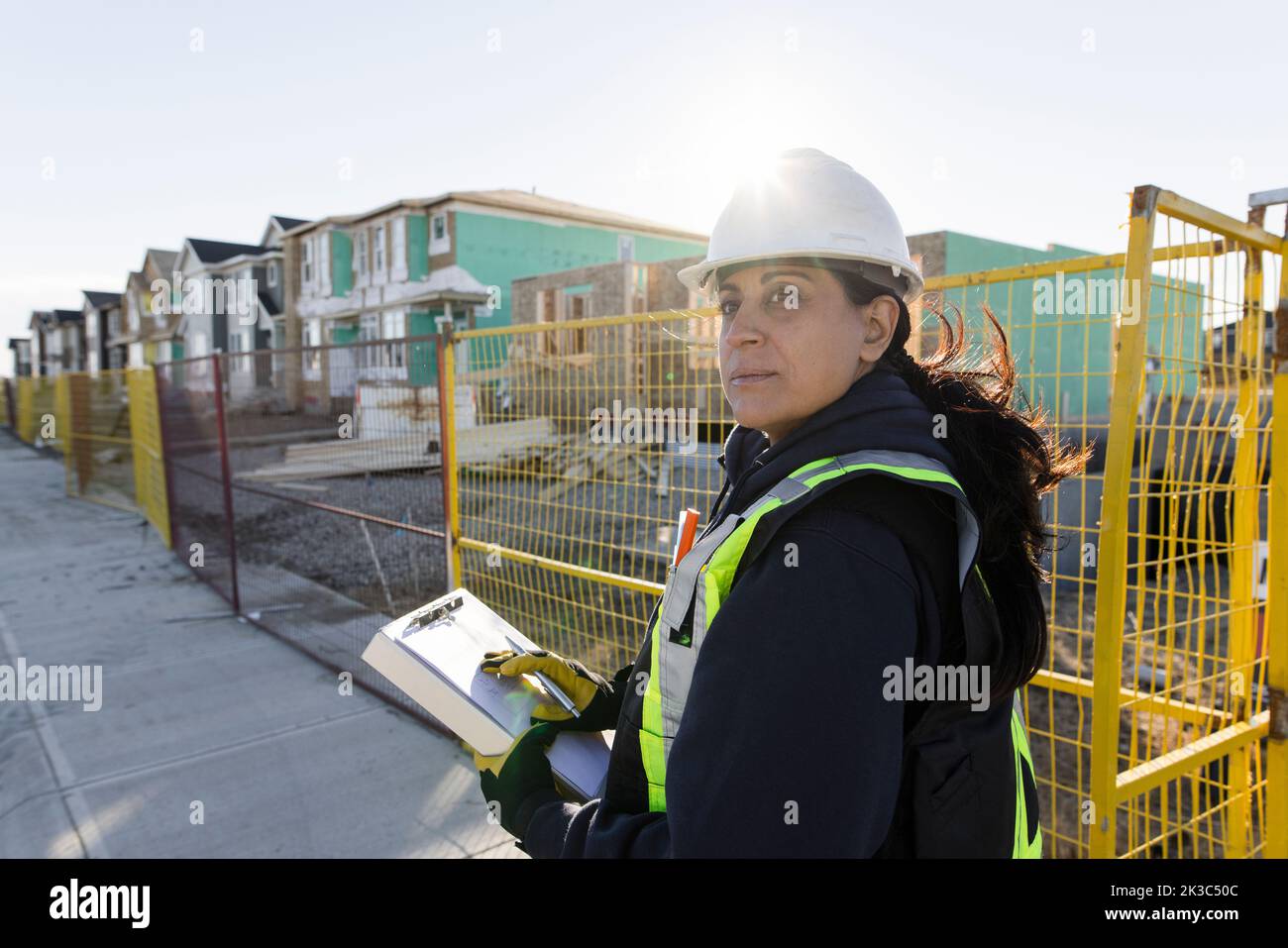 Thoughtful female worker hard hat hi-res stock photography and images ...