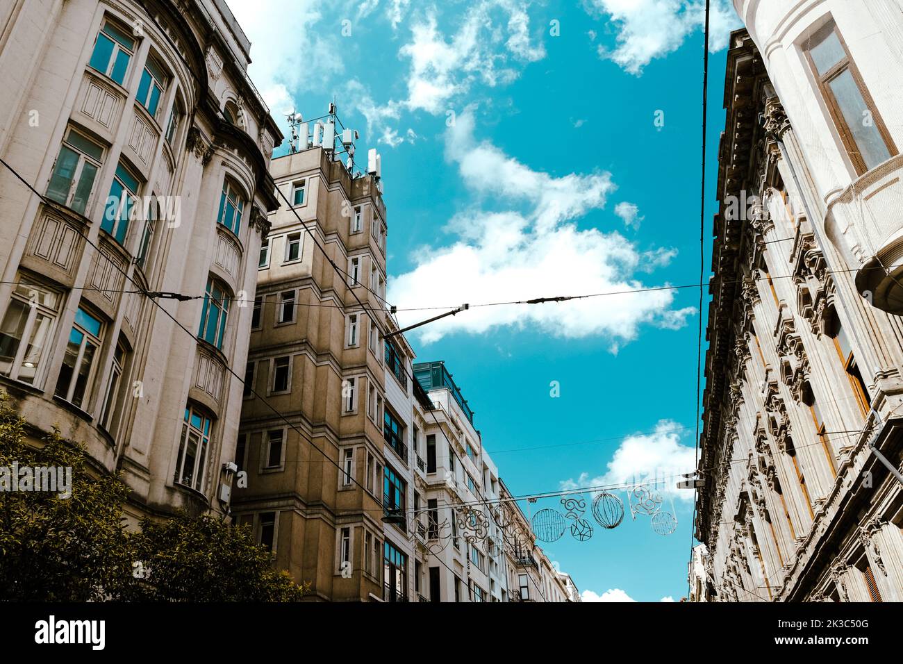 Beautiful cityscape with old buildings and blue sky in Istiklal Street ...
