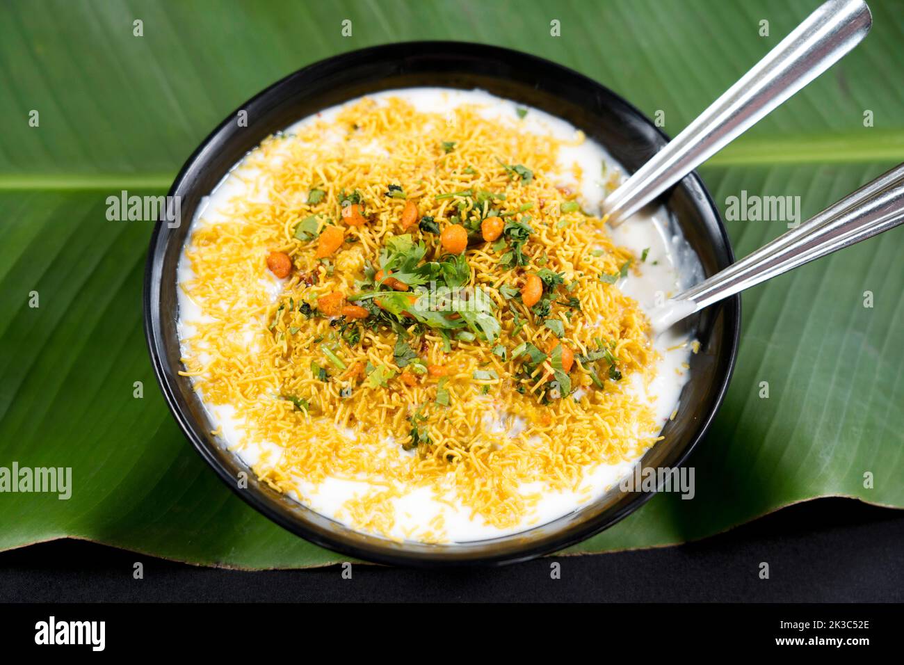 Dahi wada popular north Indian Snack. Fried lentil dumpling fritters in ...