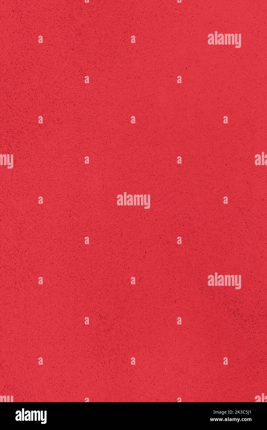 Saturated crimson red colored low contrast Concrete textured background ...