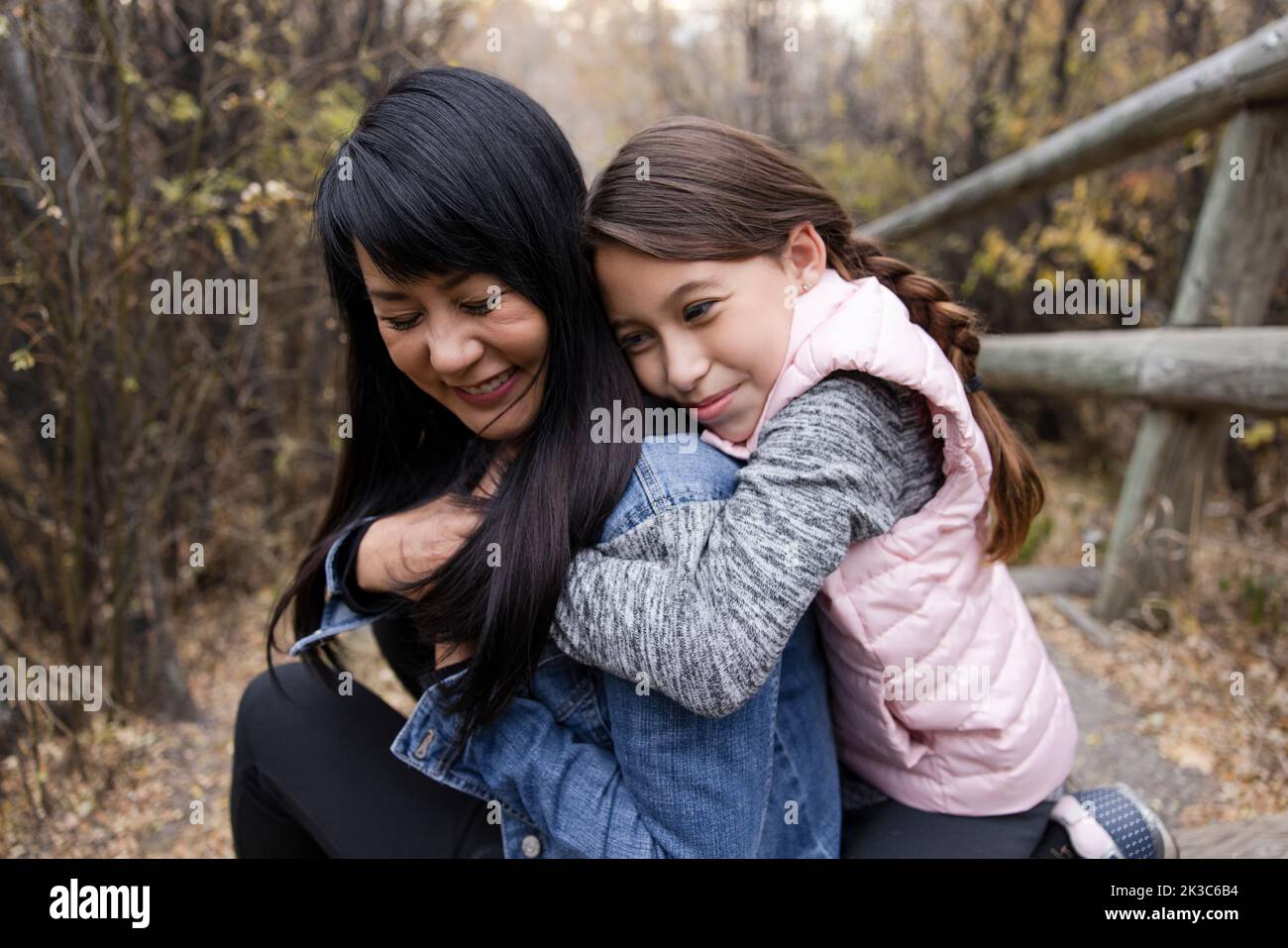 Daughter hugging mother hi-res stock photography and images - Alamy