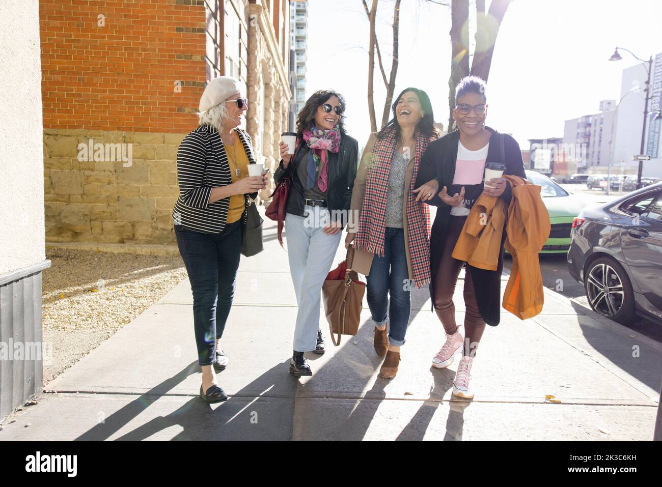 Mature women friends laughing autumn hi-res stock photography and ...