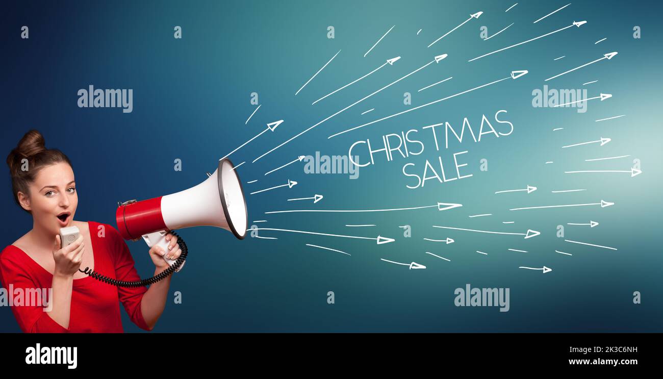 Young girl screaming to megaphone Stock Photo - Alamy