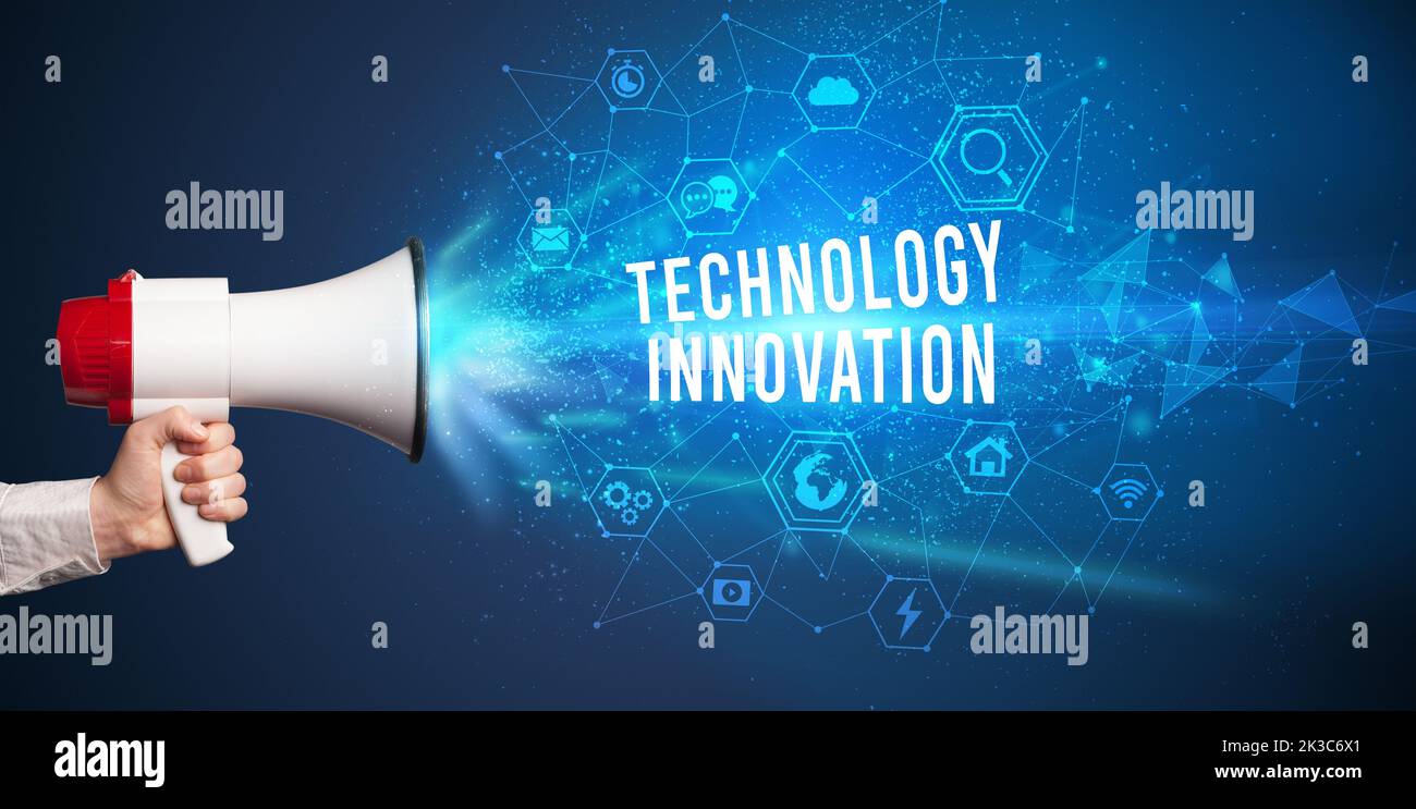 Young woman shouting in megaphone, technology announcement concept ...