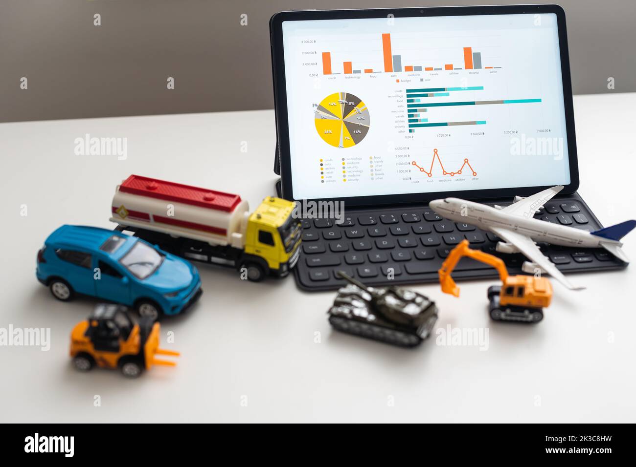 Tablet computer with different types of toy transport. auto center ...