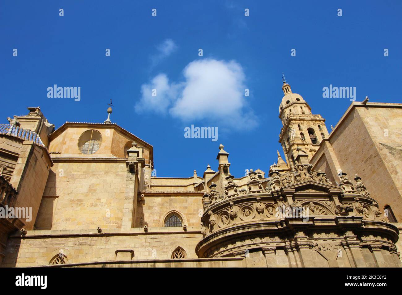A low angle shot of Catedral de Murcia on blue sky background in Murcia ...