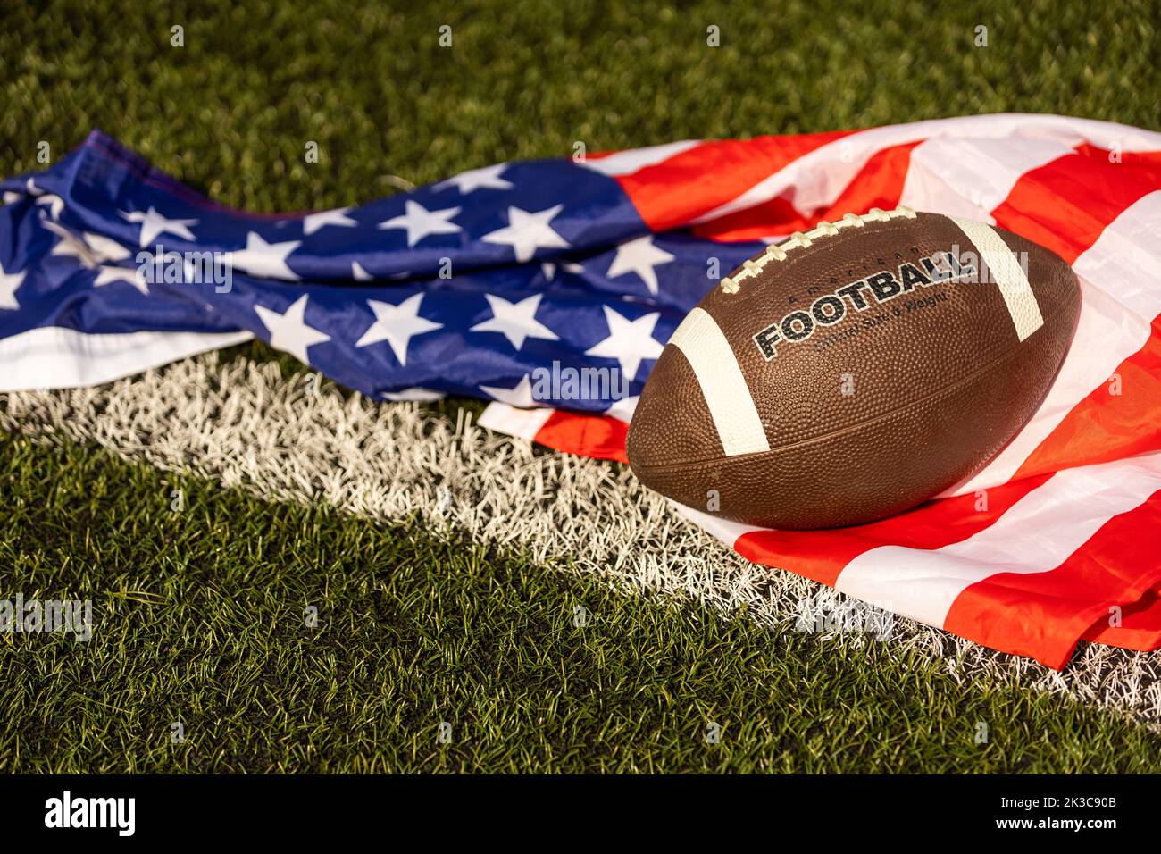 american football ball and flag Stock Photo - Alamy