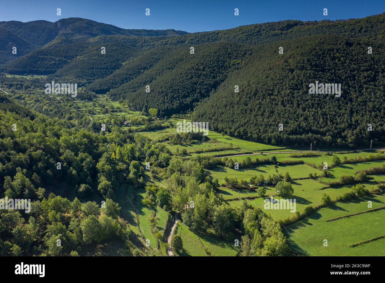 Aerial view of green fields in the valley of Sant Julià de Cerdanyola ...