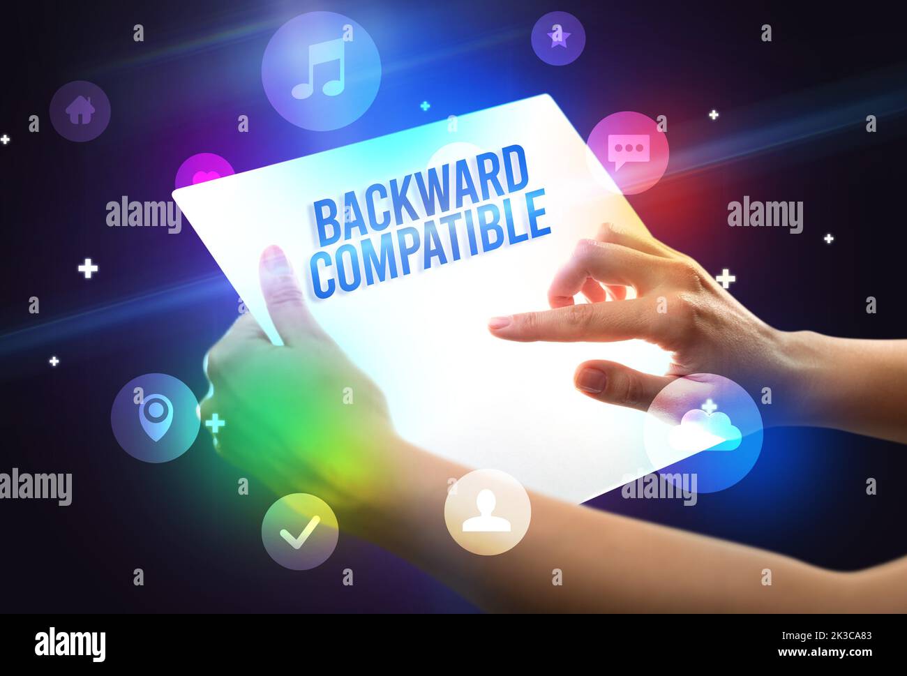 Holding futuristic tablet, new media concept Stock Photo - Alamy