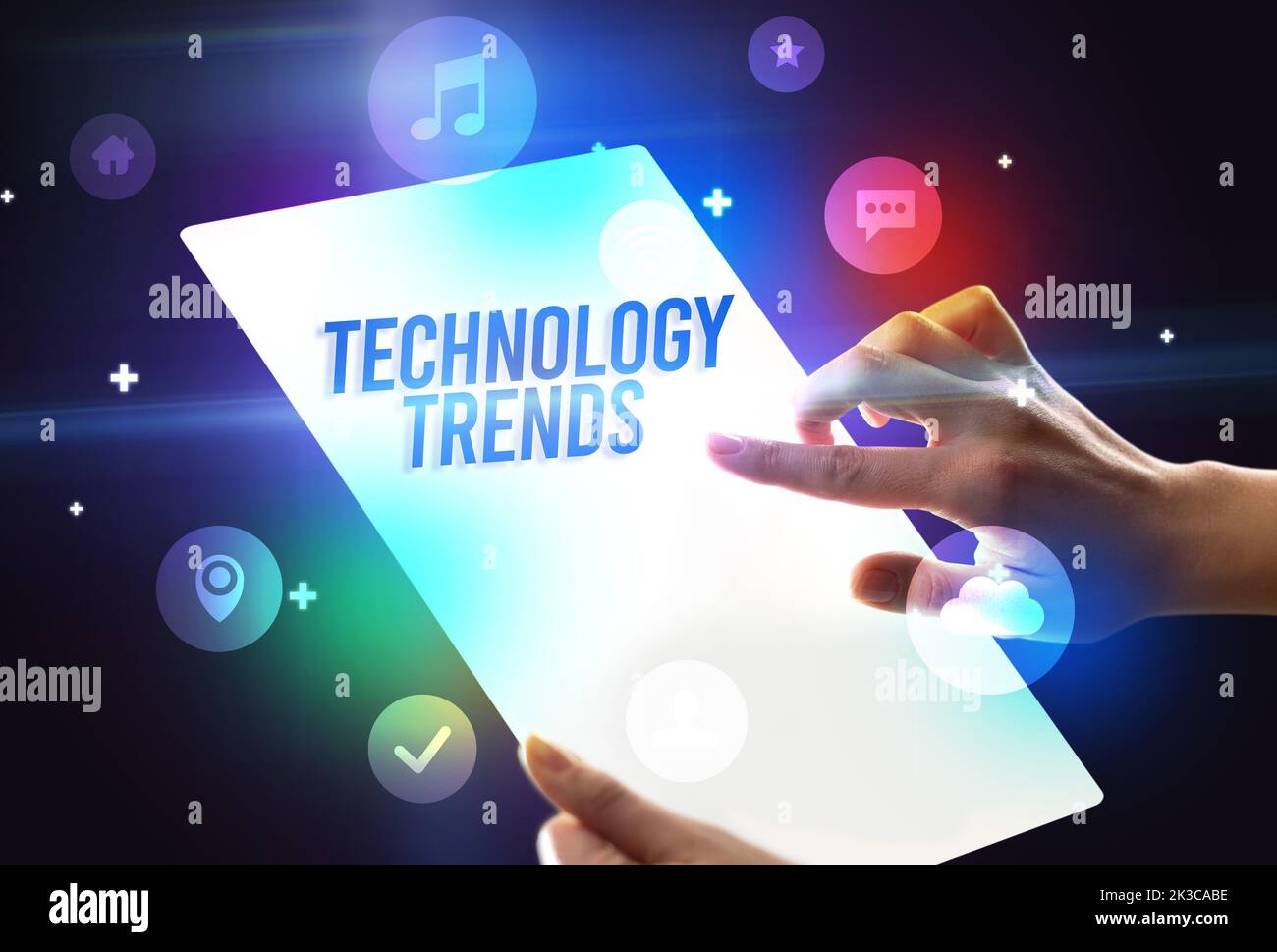 Holding futuristic tablet, new media concept Stock Photo - Alamy