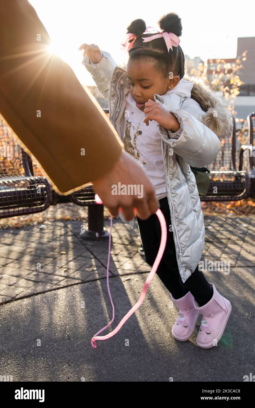 African american girl jumping rope hi-res stock photography and images ...